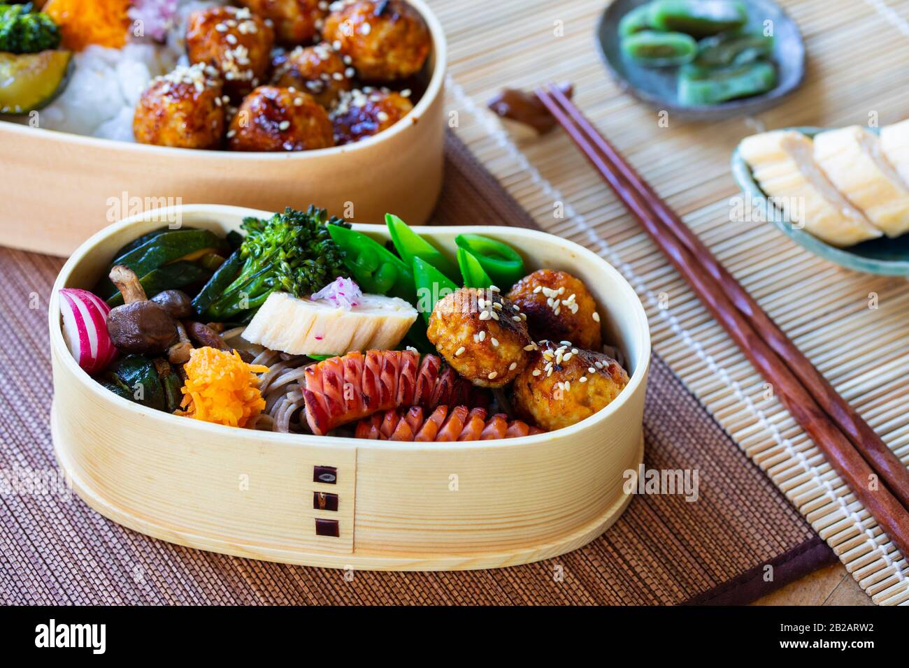 Japanese bento box with meatballs, sausage and vegetables Stock Photo ...