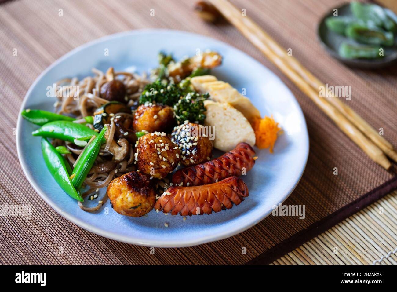 Japanese bento meal with meatballs, sausage and vegetables Stock Photo ...