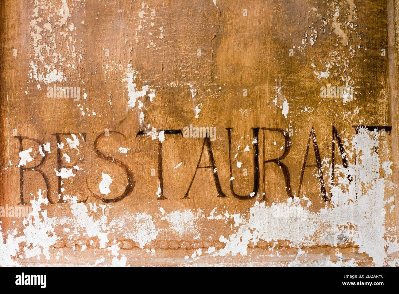 Old weathered and textured plaster wall with text Stock Photo - Alamy