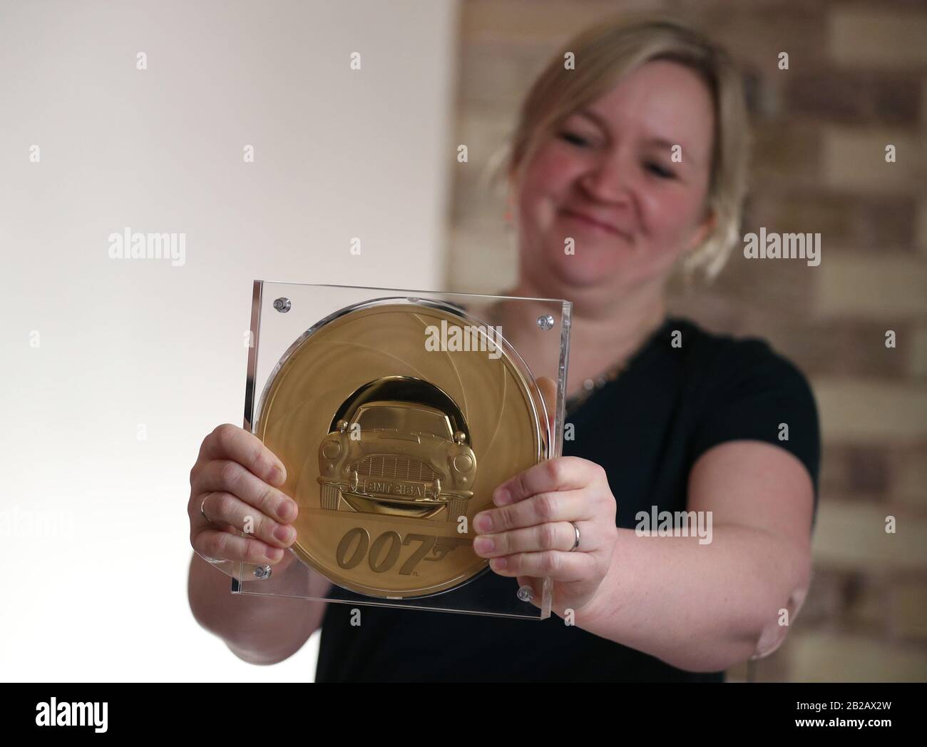 Royal Mint designer Laura Clancy, who designed a unique 7 kilo gold ...