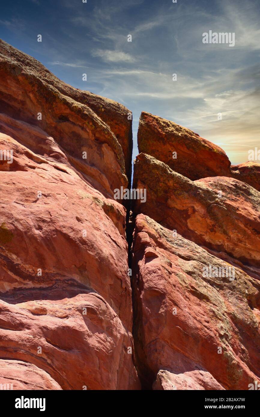Ancient split in a red rock mountain Stock Photo - Alamy