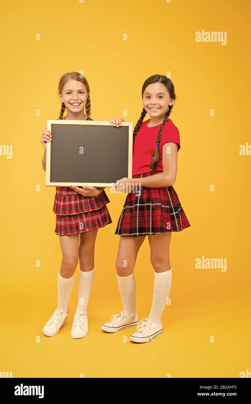 Cheerleading classes. School girls cute pupils red uniform hold ...