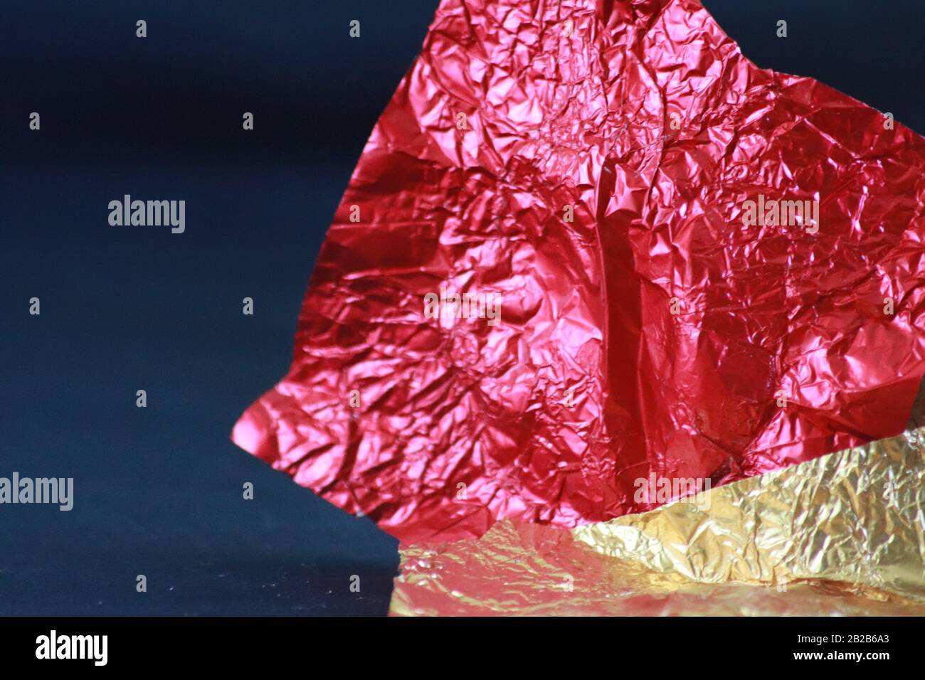 Red and gold aluminium foil Stock Photo - Alamy