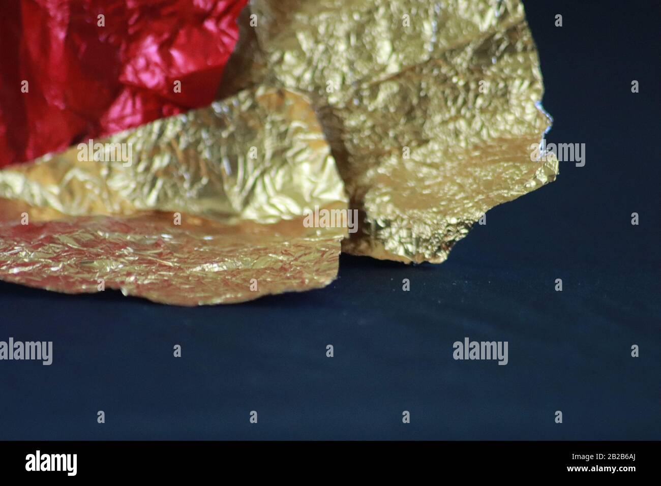 Red and gold aluminium foil Stock Photo - Alamy