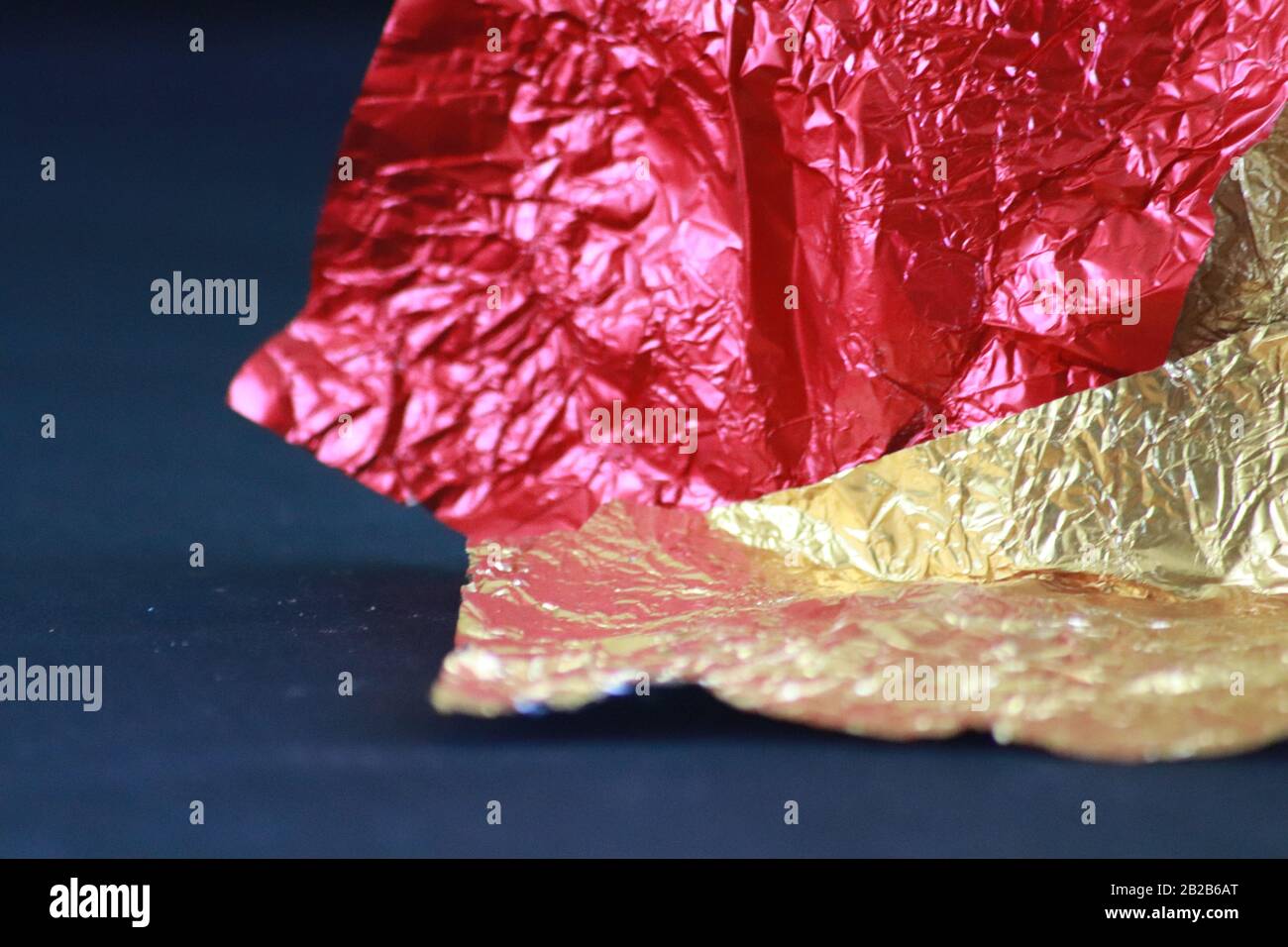 Red and gold aluminium foil Stock Photo - Alamy