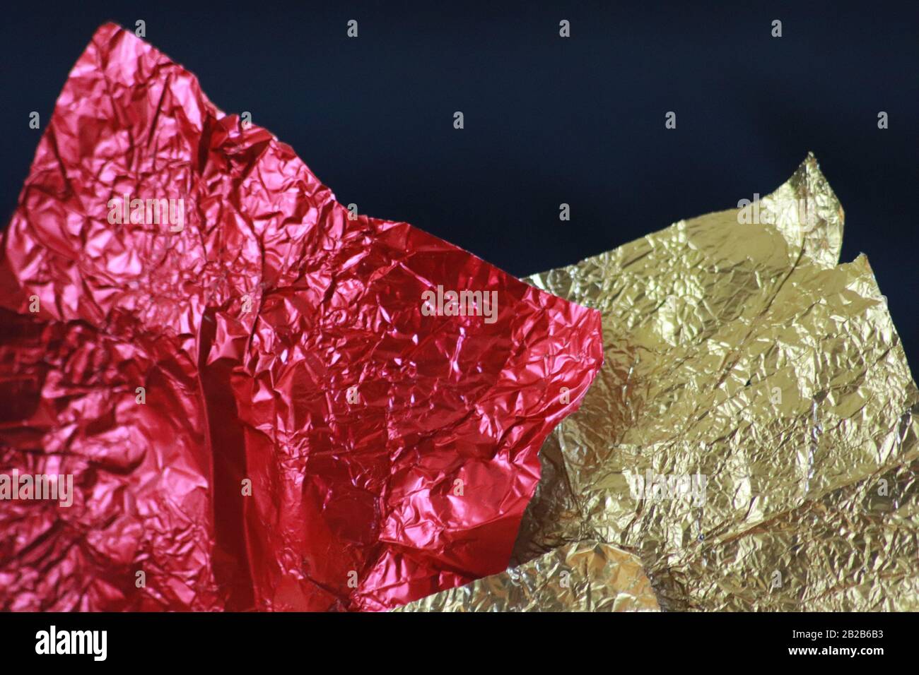 Red and gold aluminium foil Stock Photo - Alamy