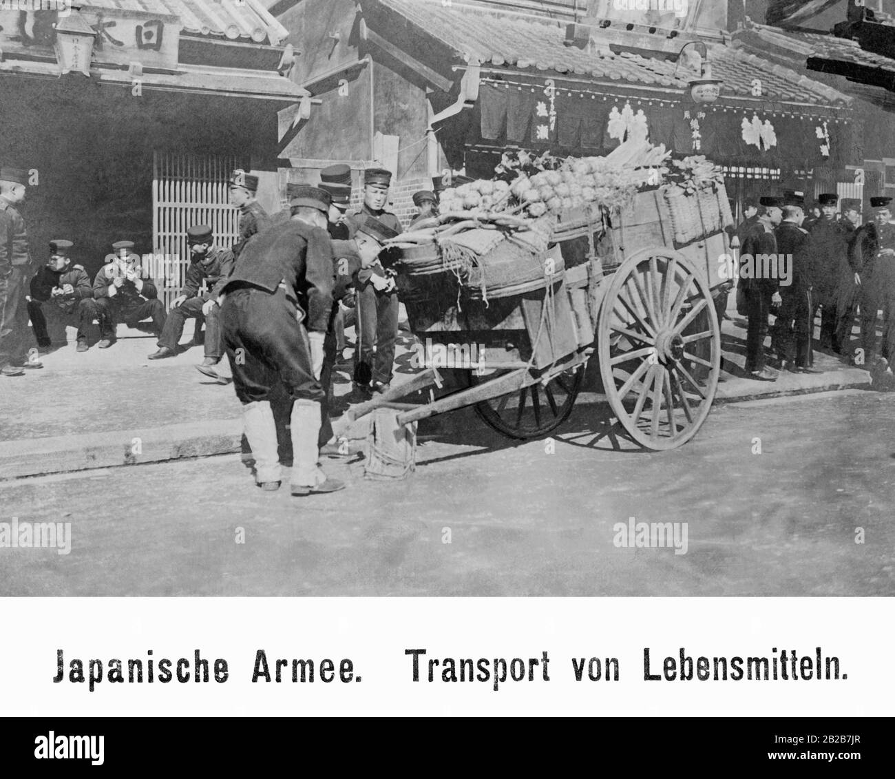 Japanese soldiers loading food onto a cart Stock Photo - Alamy