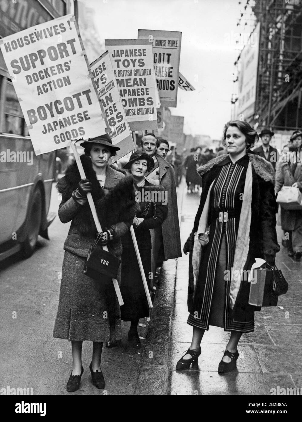 A group protests in London for a boycott of Japanese products and goods ...