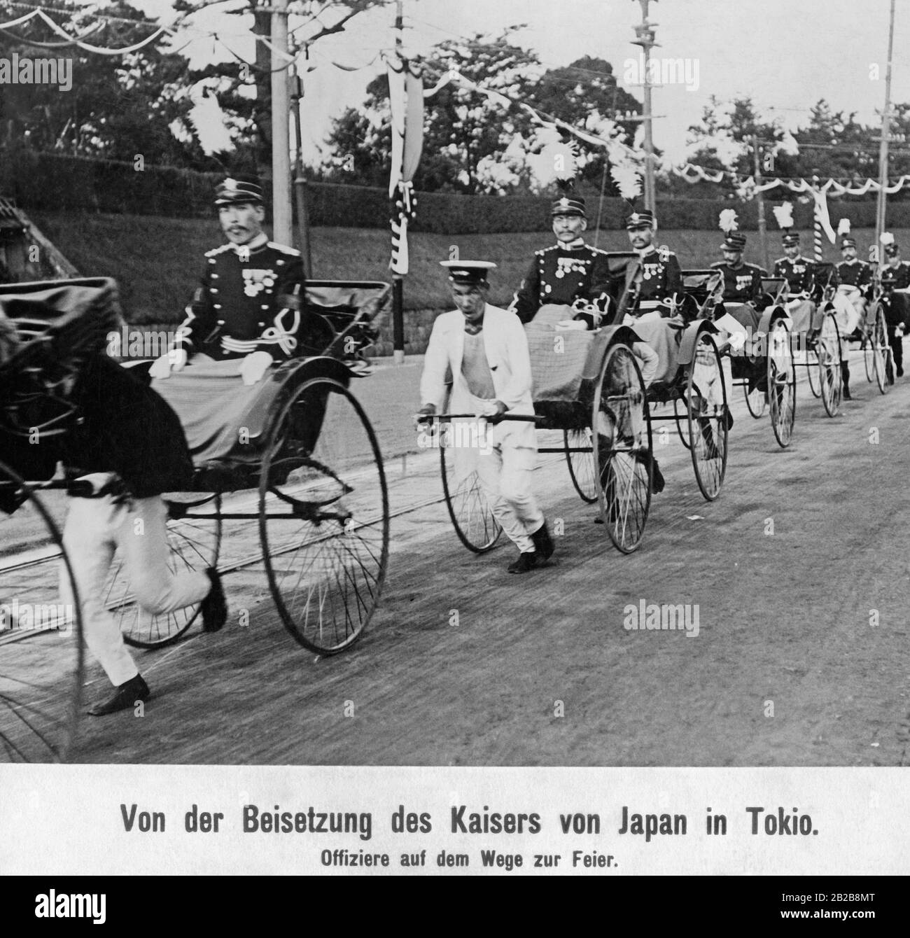 Some officers of the Imperial Japanese Army are driven with rickshaws ...