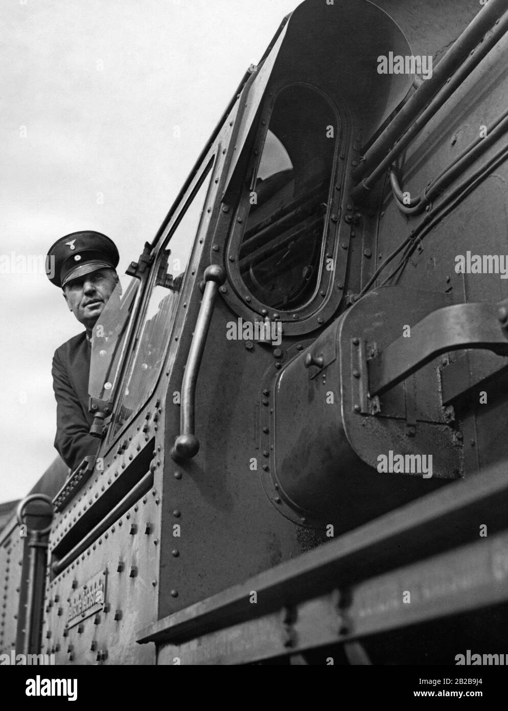 Railway engine driver Black and White Stock Photos & Images - Alamy