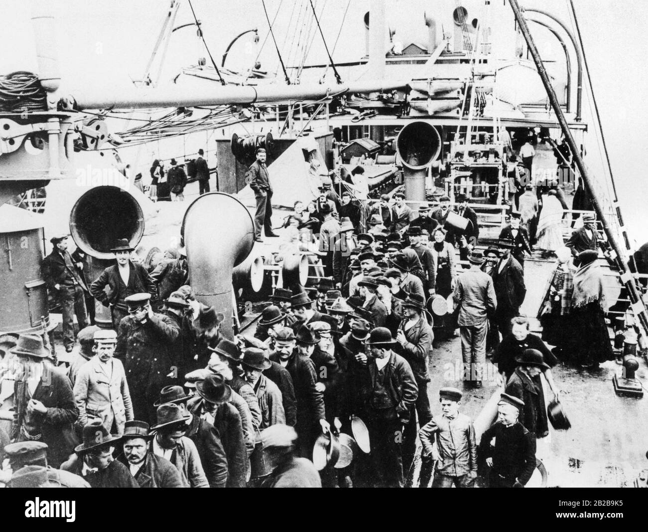 Steerage passengers receiving food on the ship Imperator Stock Photo ...
