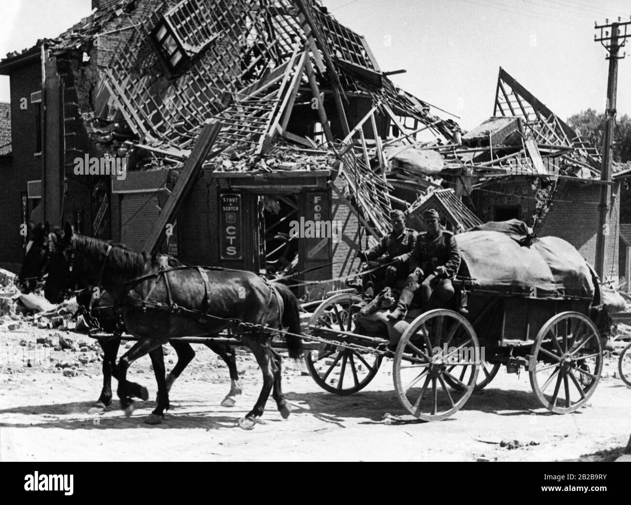 German supply convoy in a town in northern France Stock Photo - Alamy