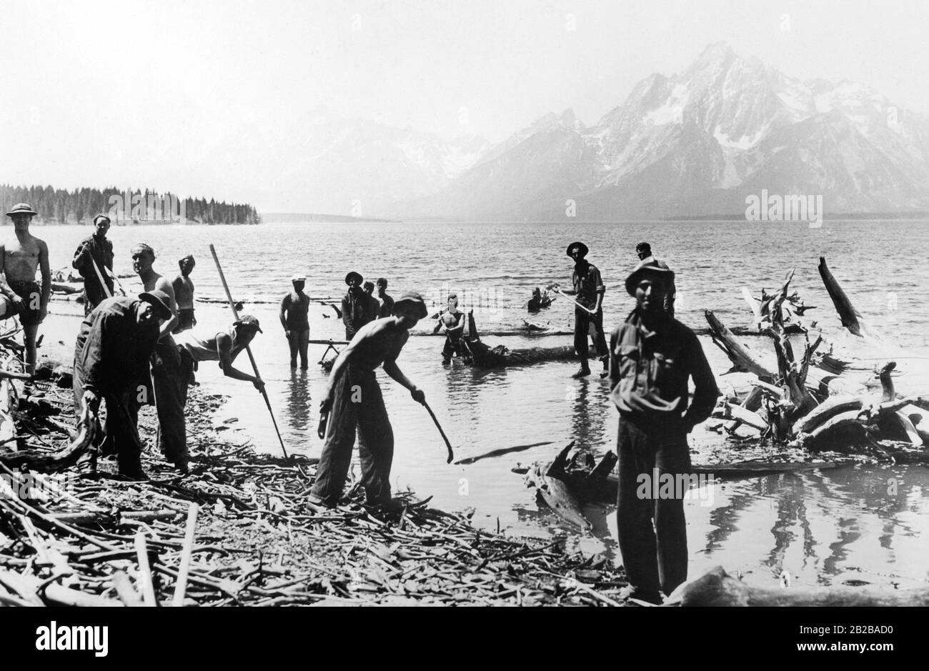 Civilian Conservation Corps (A work relief program): Workers clean up ...
