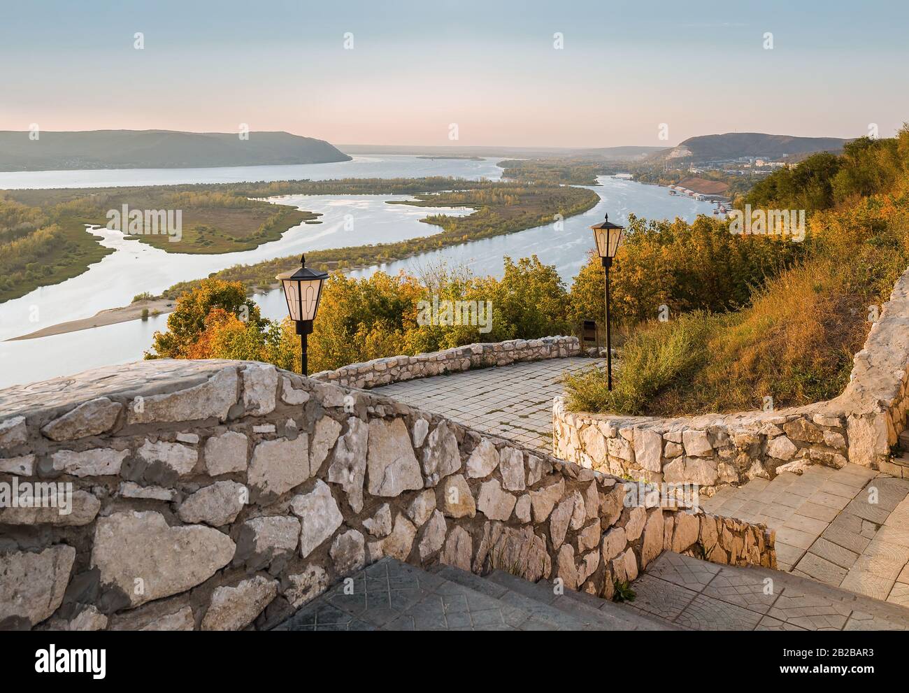 View of the valley of the Volga river from the hill on the sunset Stock ...