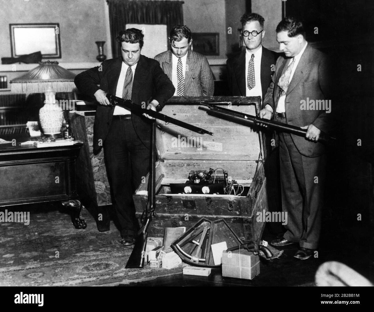 Prohibition: Policemen confiscate weapons and a radio, that was used to ...