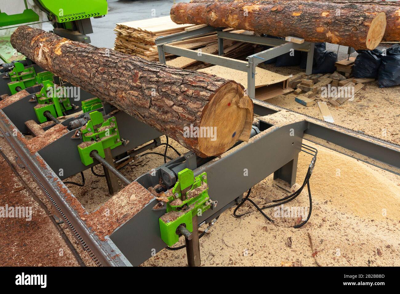 Large tree log is automatically quickly and accurately cut at a modern ...