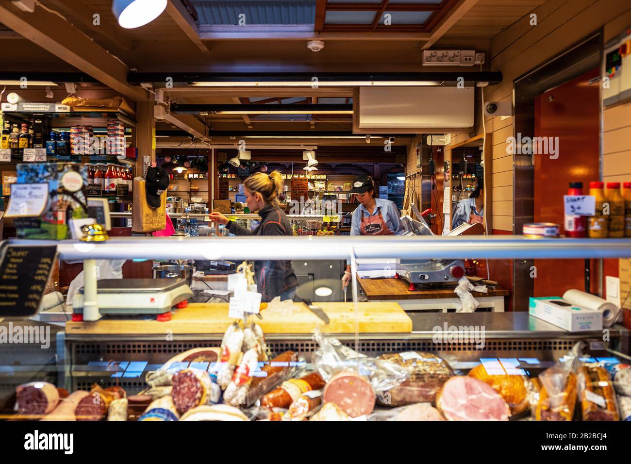 Young shopkeepers in the old market hall hi-res stock photography and ...