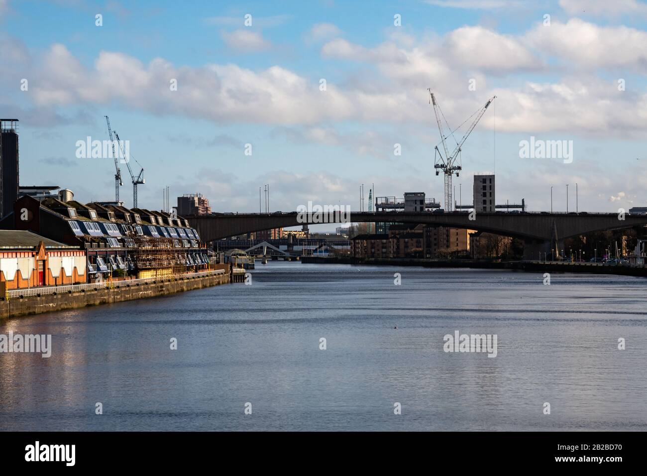 The Kingston Bridge crosses the River Clyde with Lancefield Quay on the ...