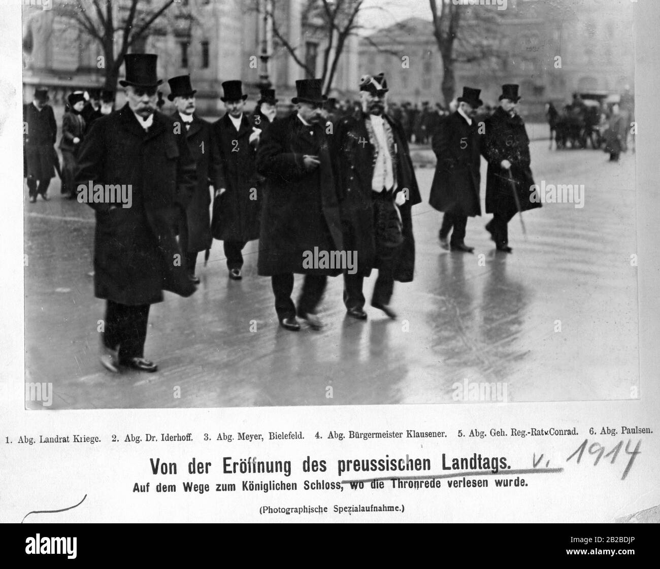 Invited guests on the way from the cathedral to the royal palace in ...