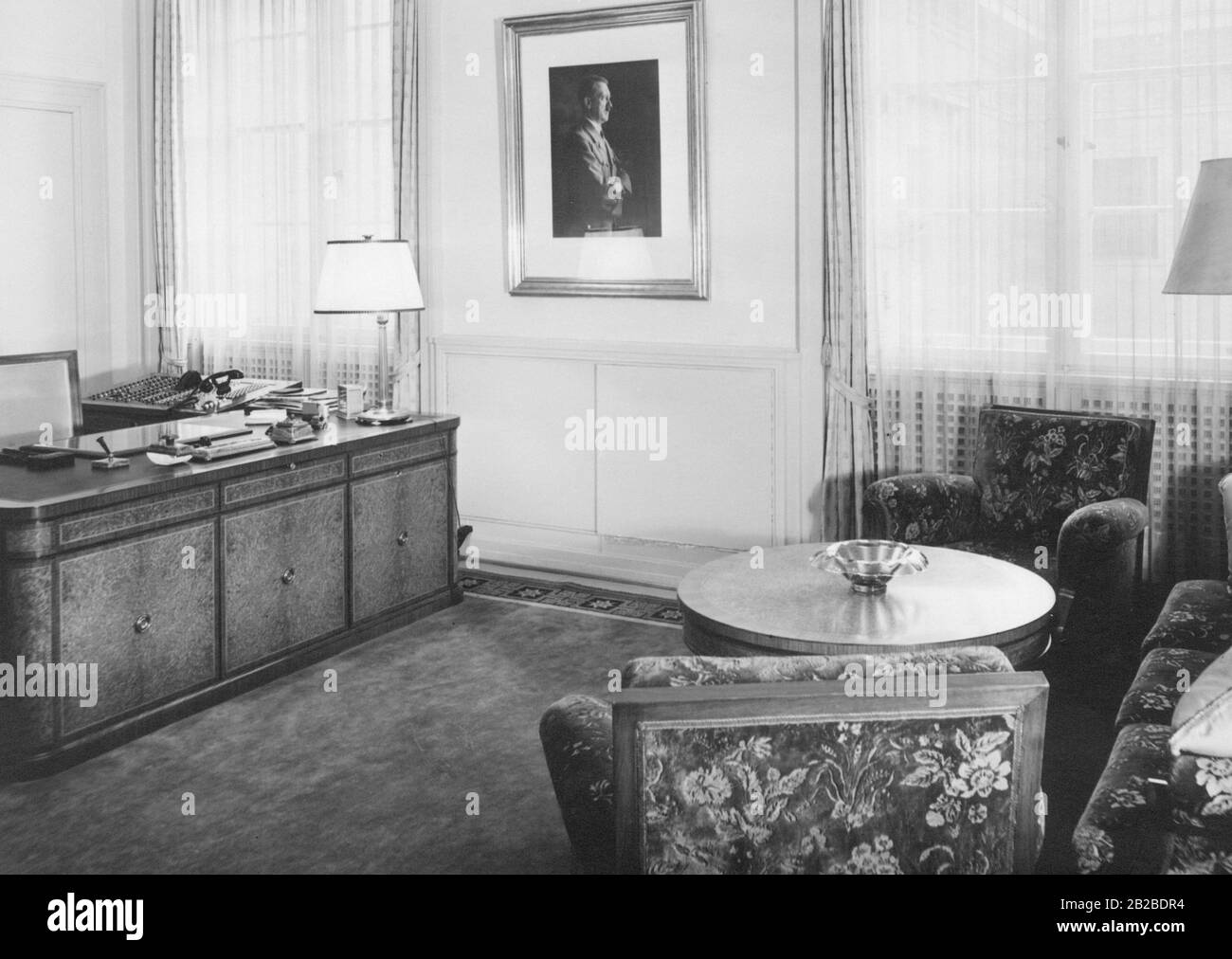 Pictured is an office in the Reich Chancellery. On the wall hangs a ...