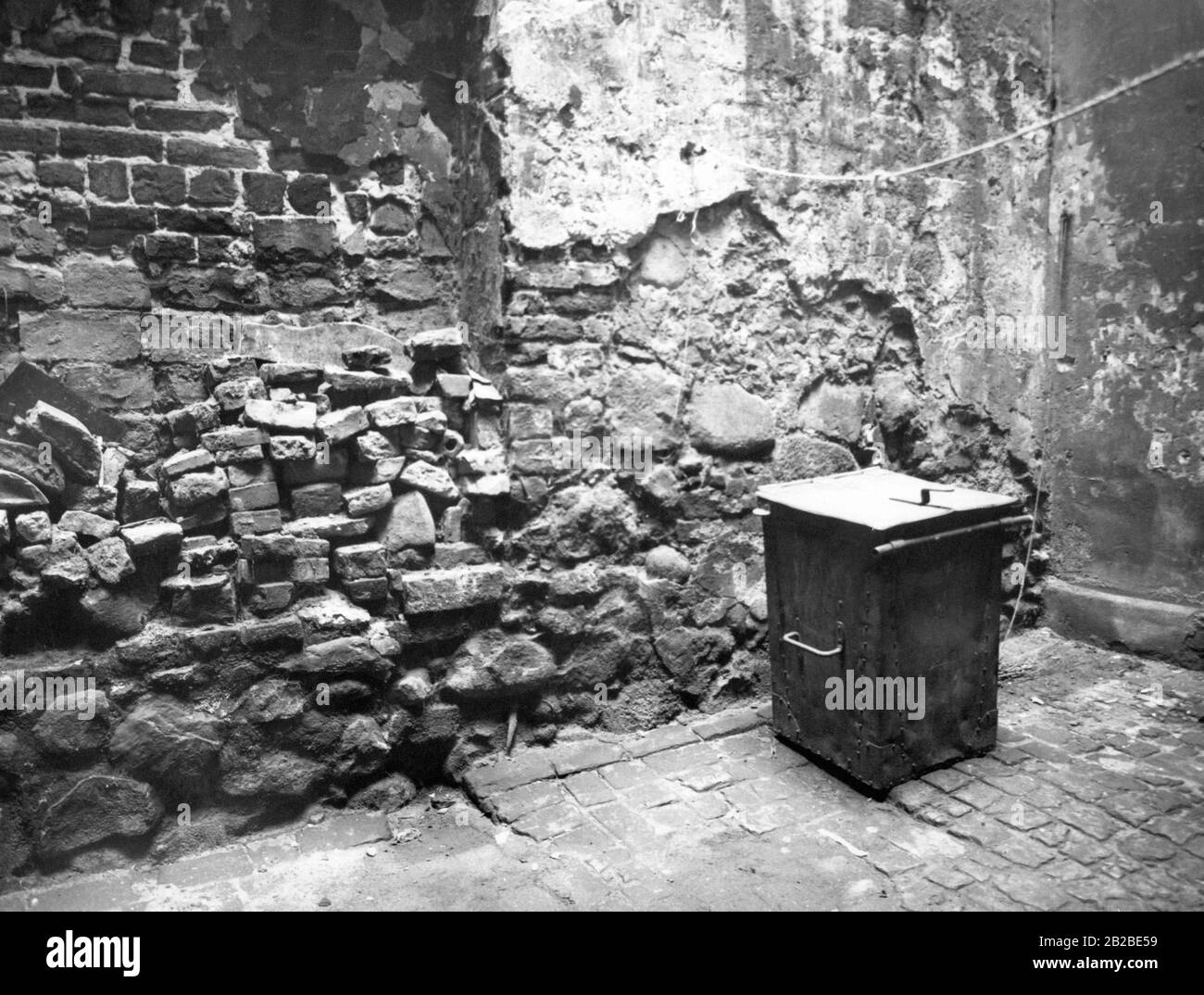 In an old backyard is a piece of the medieval Berlin city wall. The ...