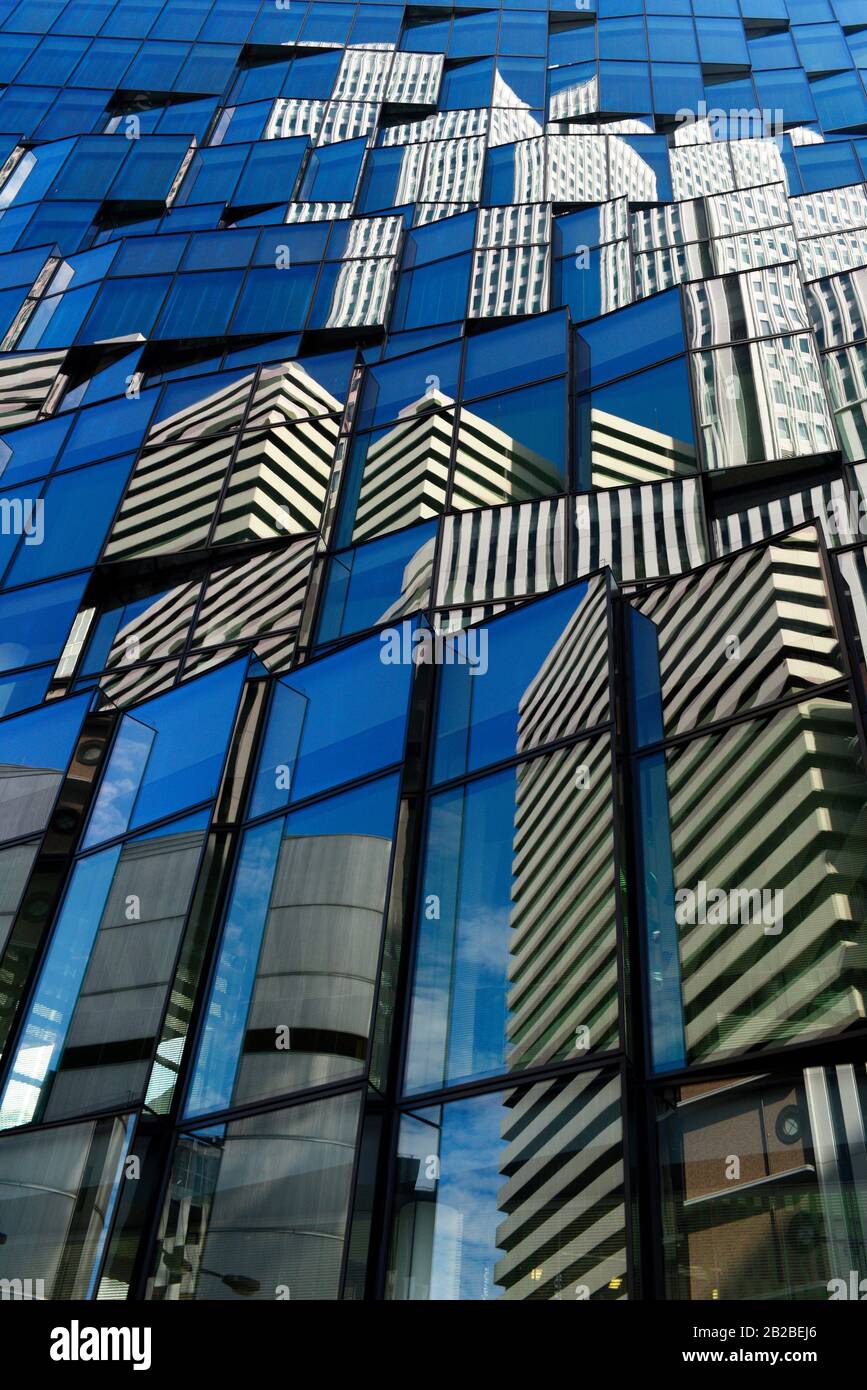 View of reflections in the glass windows of a building in Osaka,Honshu ...