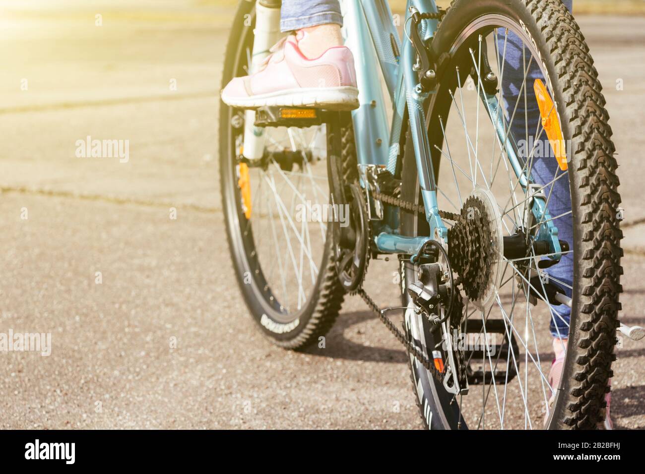 Closeup of a bicycle gears mechanism and chain on the rear wheel of ...