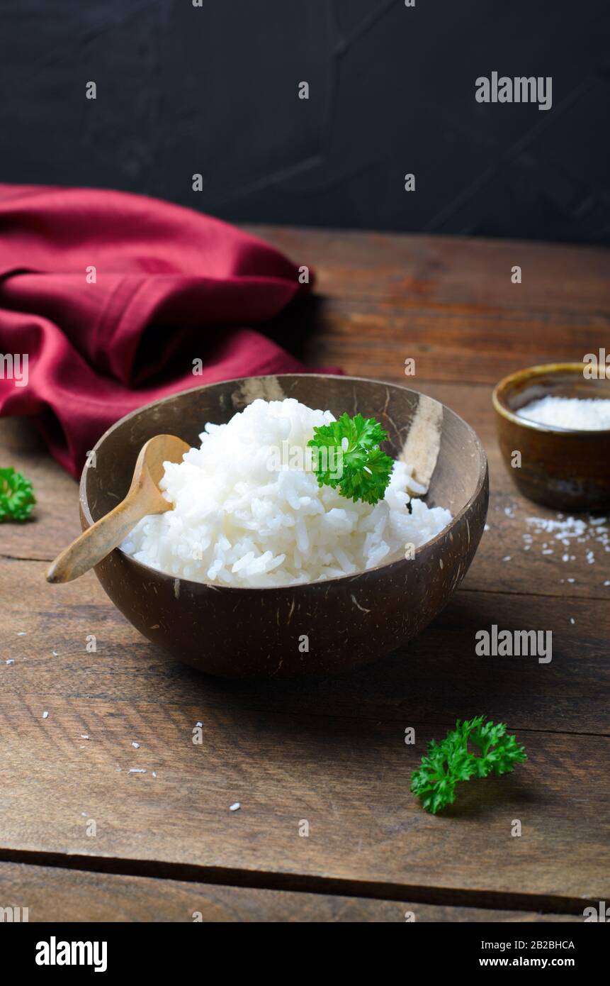 Coconut Rice, Cooked Rice Served in Coconut Shell over Wooden ...