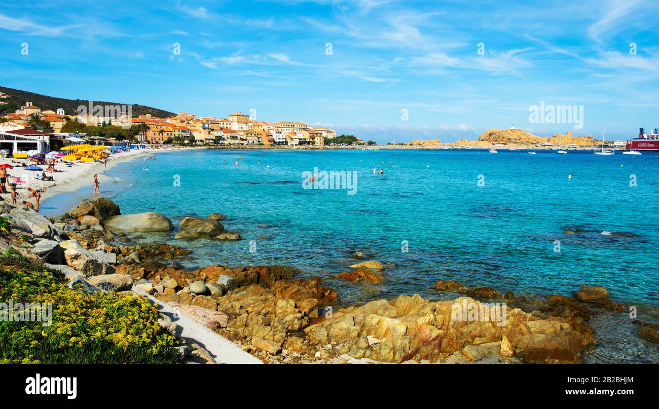 ILE-ROUSSE, FRANCE - SEPTEMBER 22, 2018: People at the main beach of ...