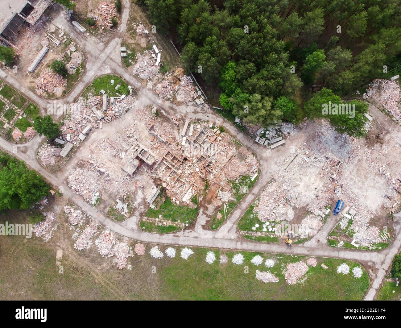 Aerial drone view of old demolished industrial building. Pile of ...