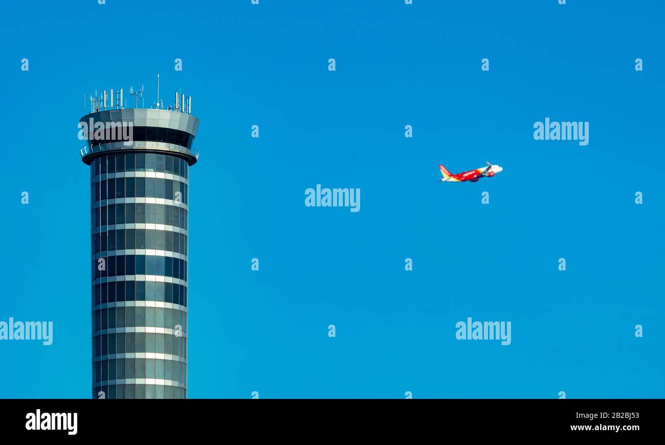 Air traffic control tower in the airport with international flight ...