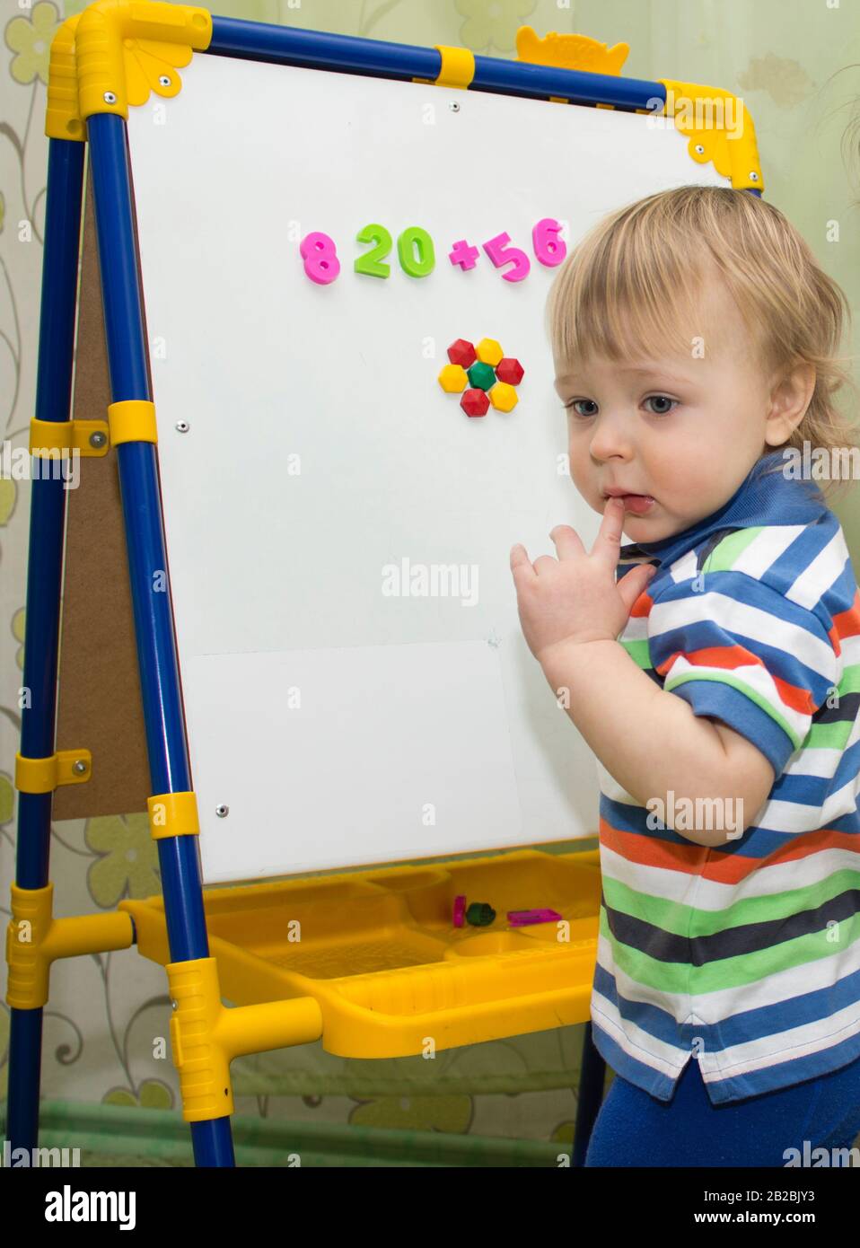 a little boy learning to count Stock Photo - Alamy
