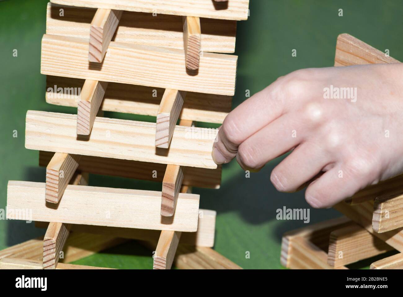 Child blocks tower hi-res stock photography and images - Alamy