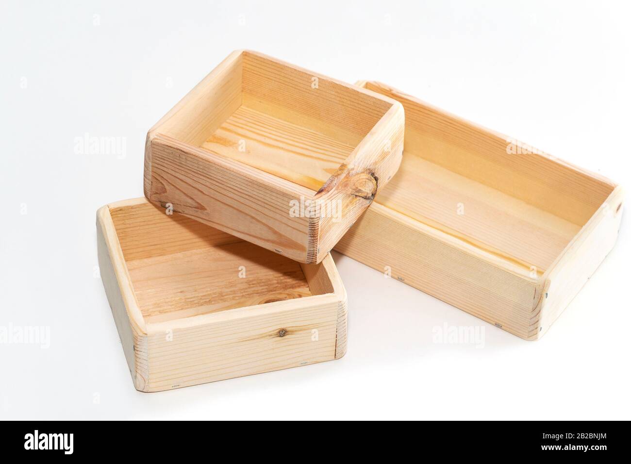 Empty wooden box. Made of pine, on a light white background Stock Photo ...