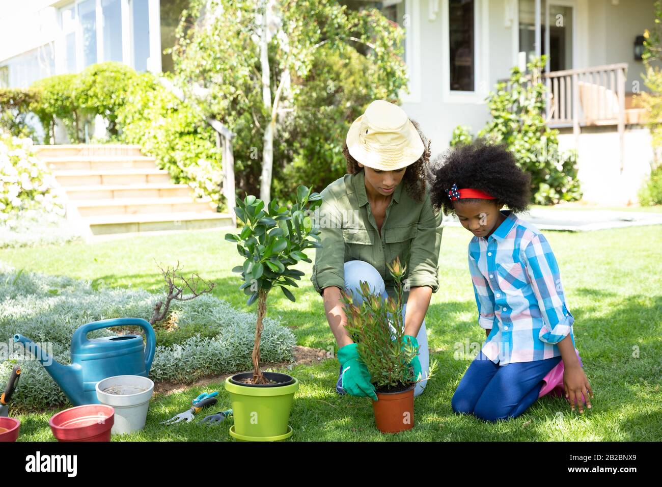 Black girl gardening hi-res stock photography and images - Alamy