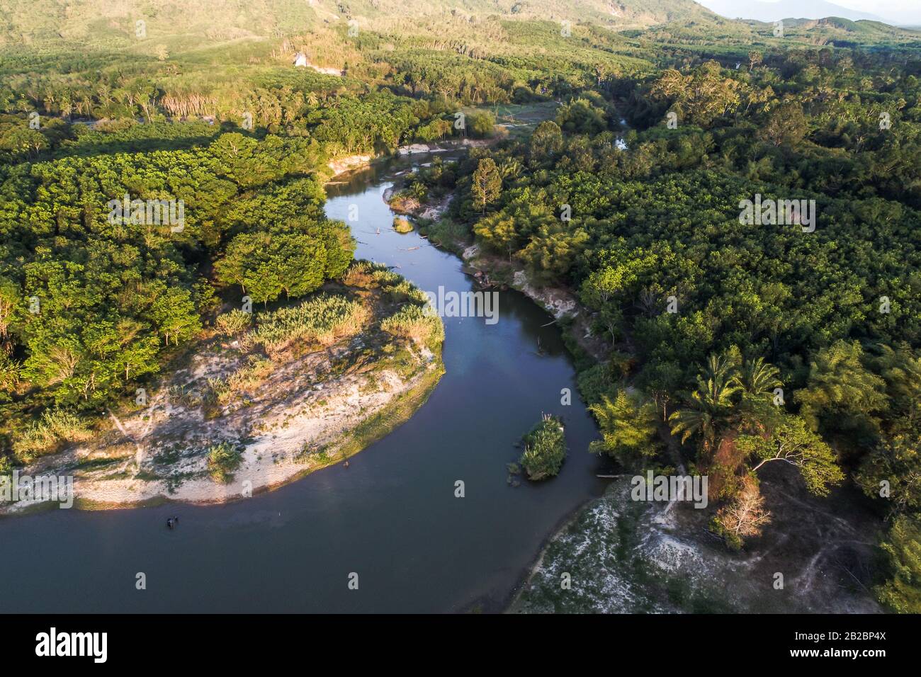 Aerial view rural village with river green tree in morning sun rise ...