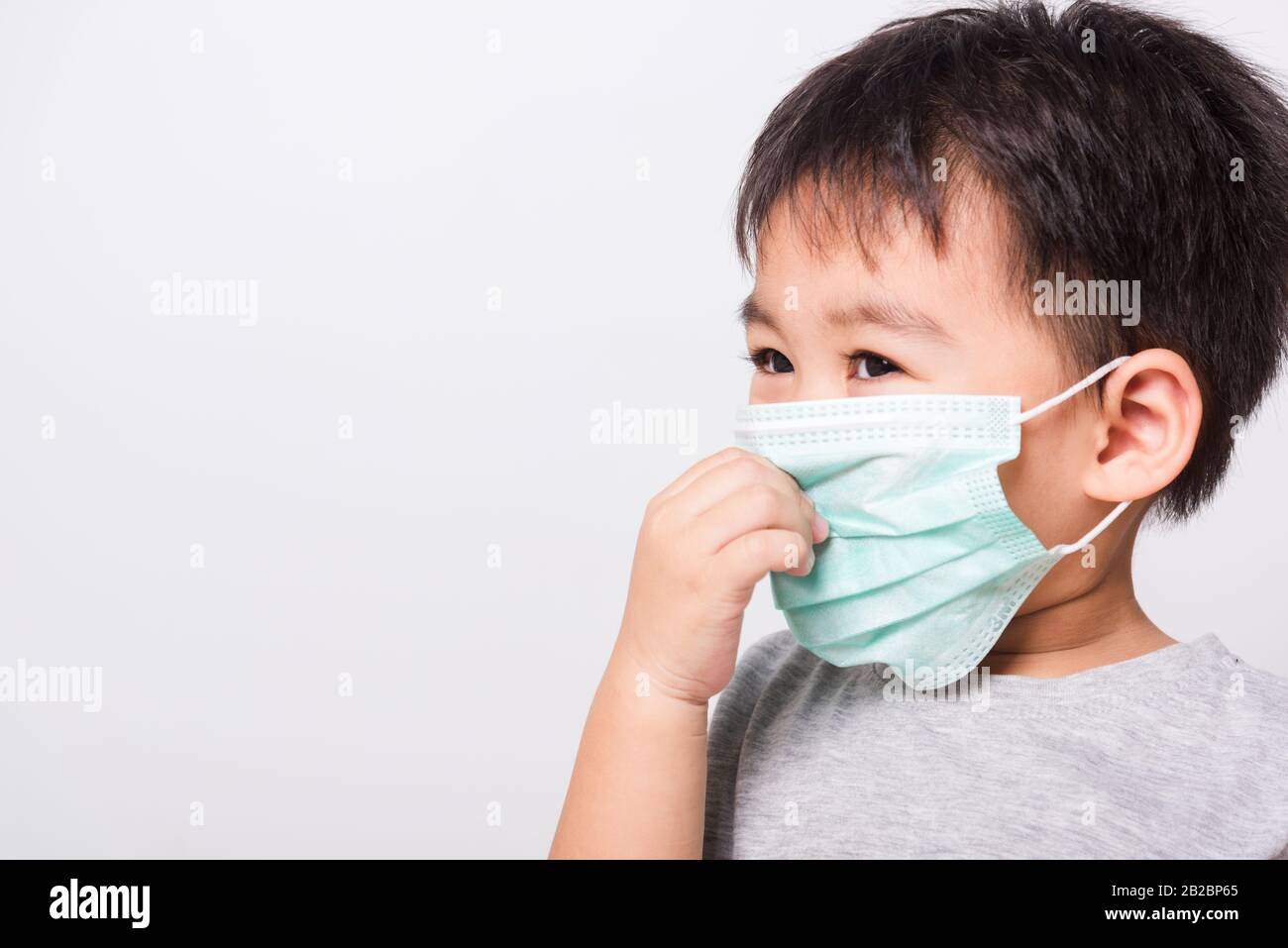 Closeup Asian face, Little children boy sick he using medicine ...