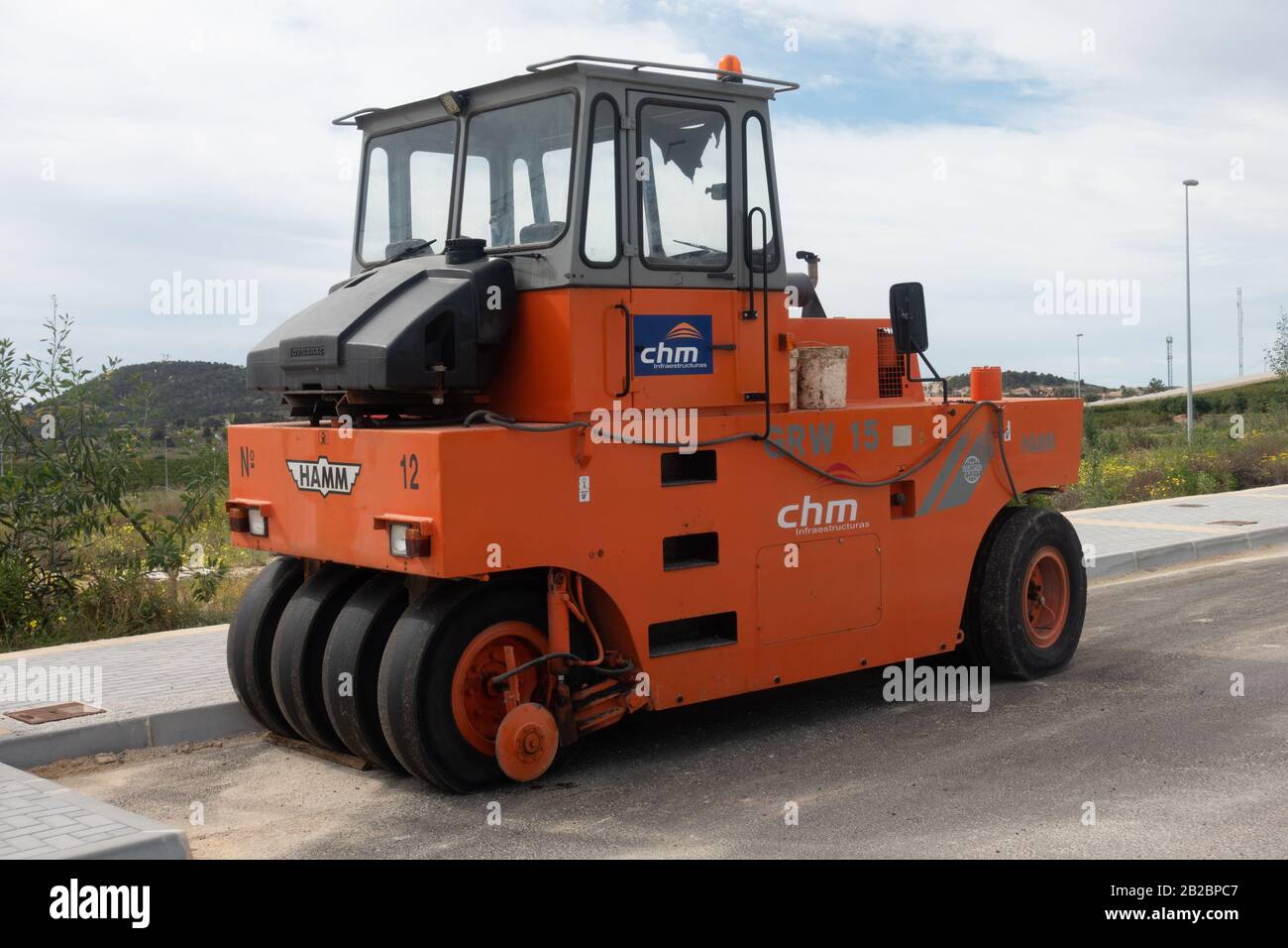 Road laying vehicle Stock Photo - Alamy