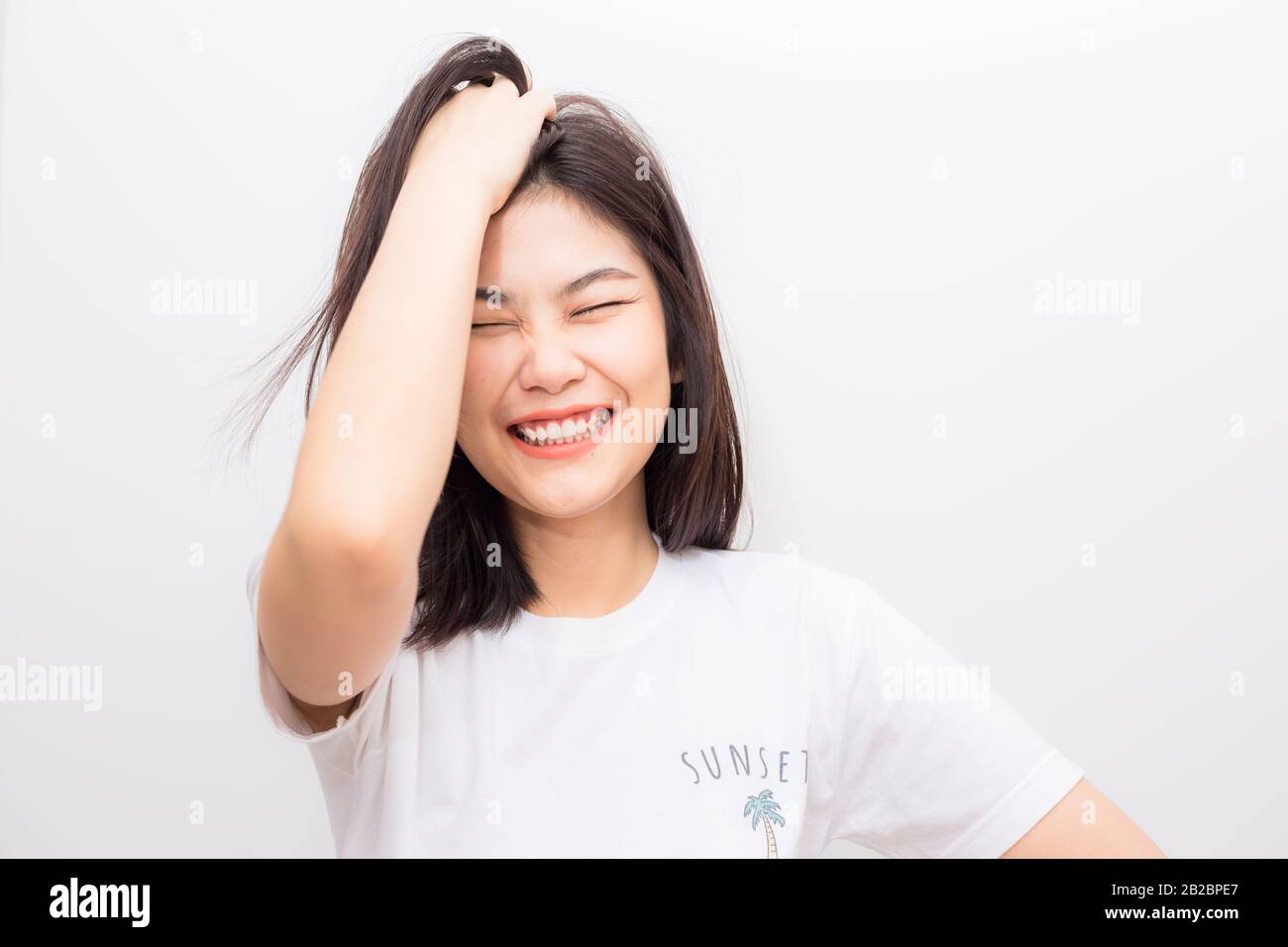 Beautiful young asian women smiling on white background studio shot ...