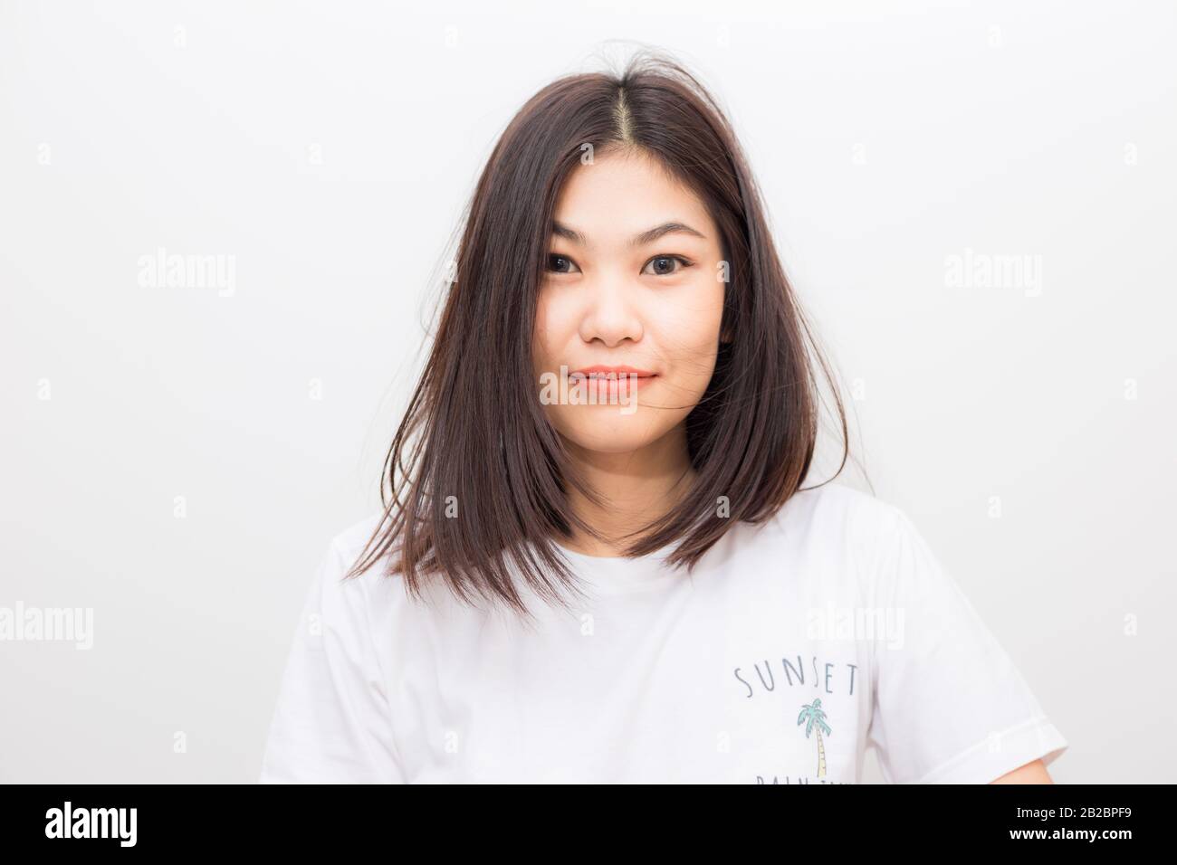 Beautiful young asian women smiling on white background studio shot ...
