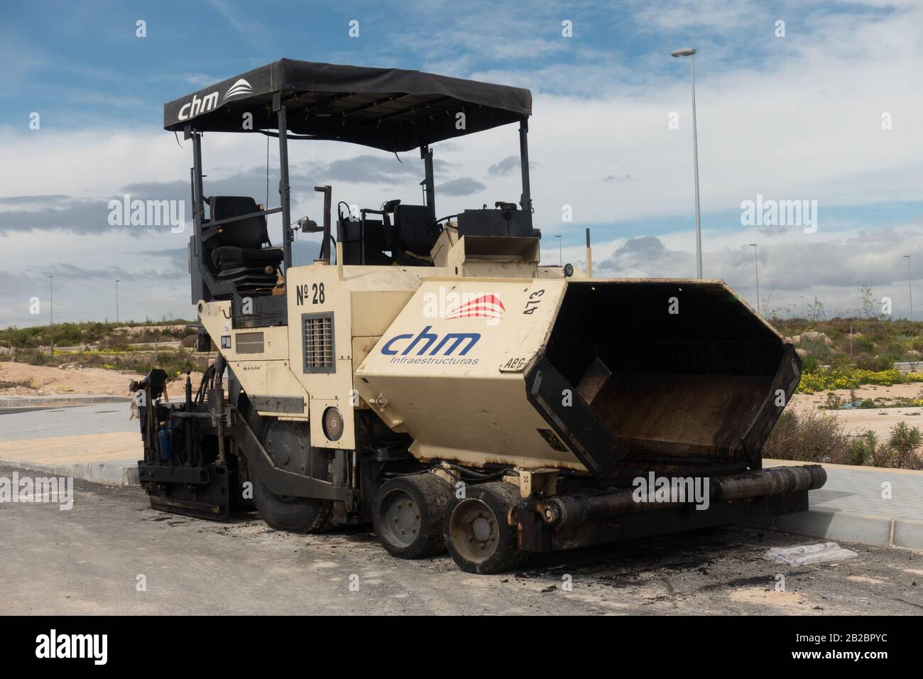 Road laying vehicle Stock Photo - Alamy
