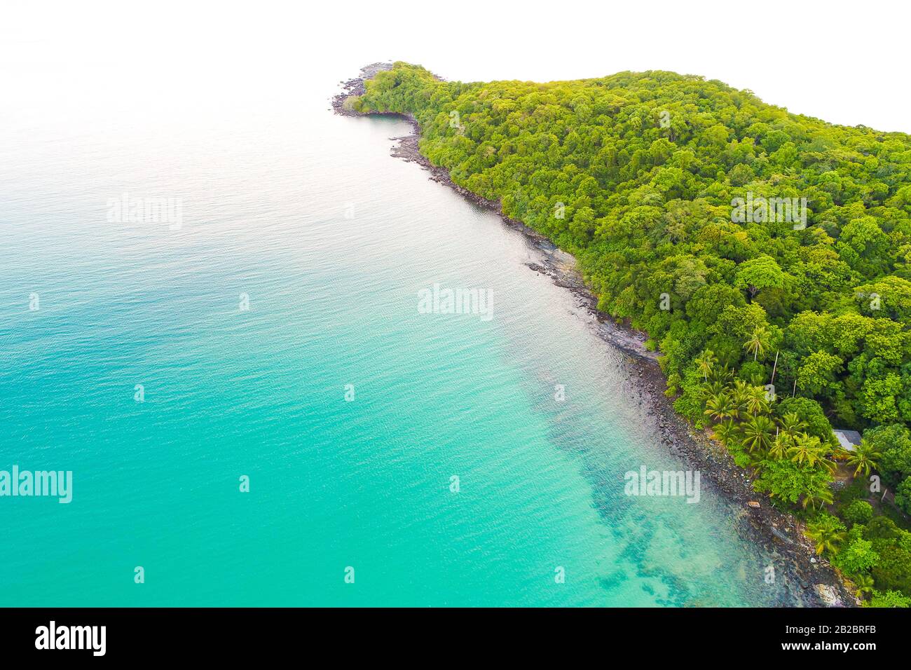 Exotic idyllic sea island with green tree forest aerial view Stock ...