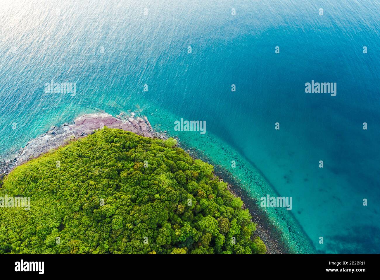 Exotic idyllic sea island with green tree forest aerial view Stock ...