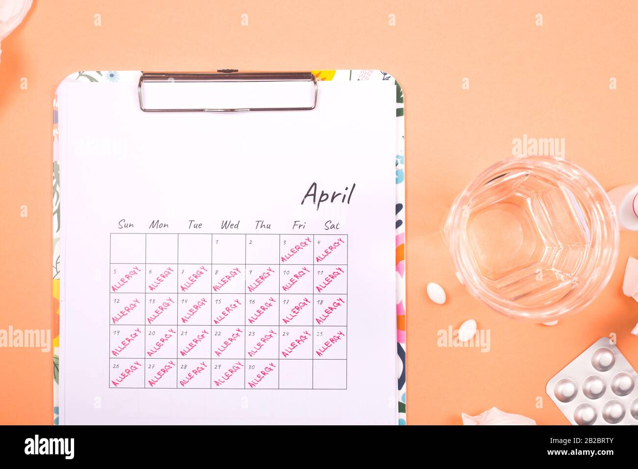 April calendar that says allergy. The concept of allergic tinitis and ...