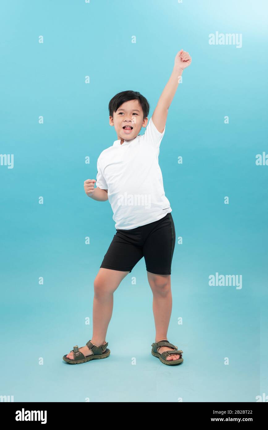 Happy and cheerful boy isolated on white Stock Photo - Alamy