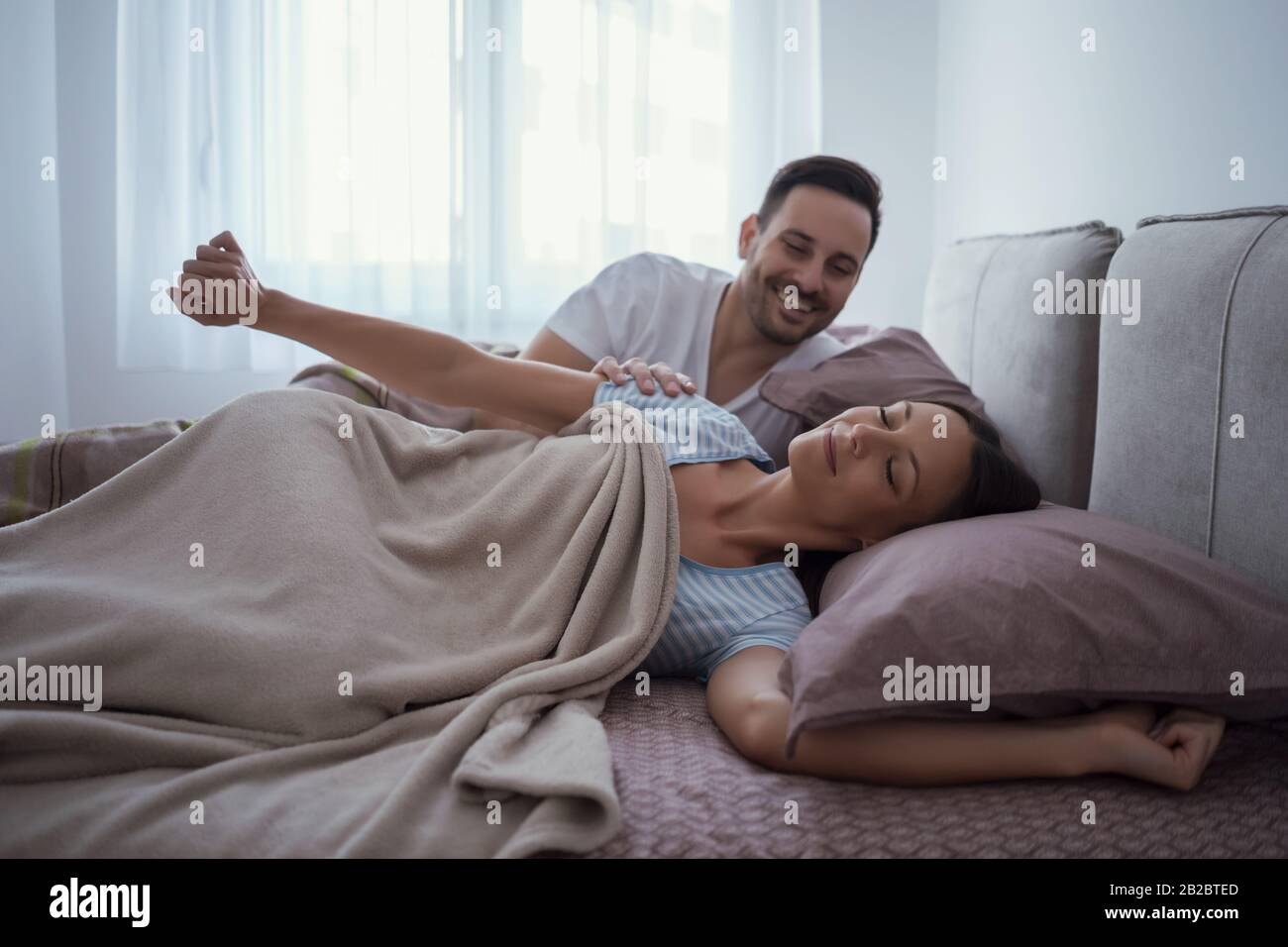 Man waking up bed hi-res stock photography and images - Alamy
