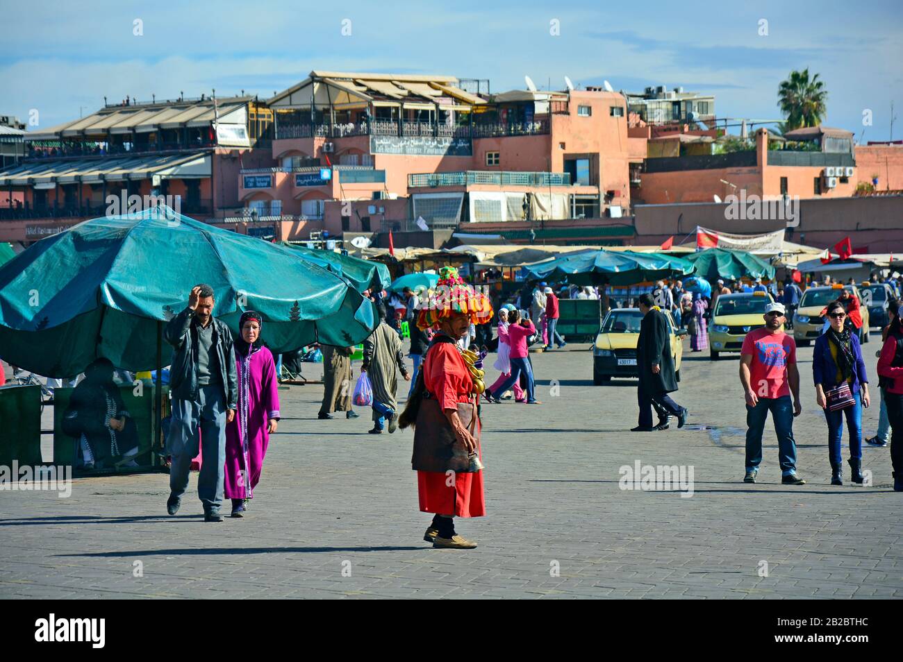 Marrakesh, Morocco - November 23rd 2014: Unidentified people and water ...