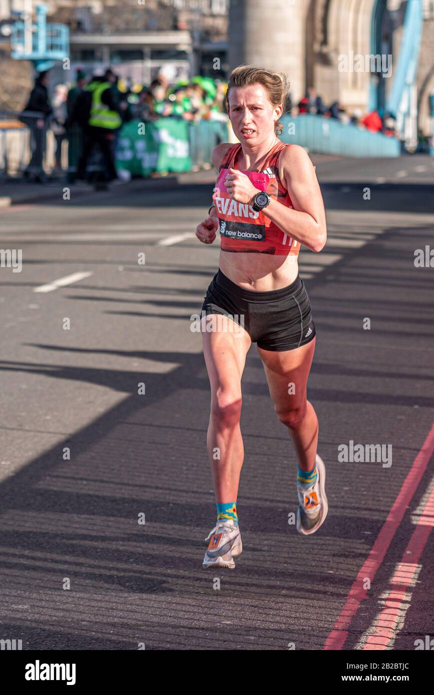Clara Evans racing in the Vitality Big Half half marathon crossing ...