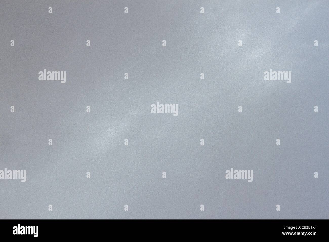 Matte metal surface with rays of light, silver color, texture and ...