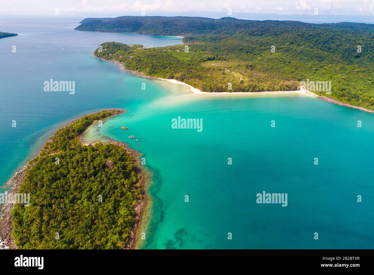 Exotic idyllic sea island with green tree forest aerial view Stock ...